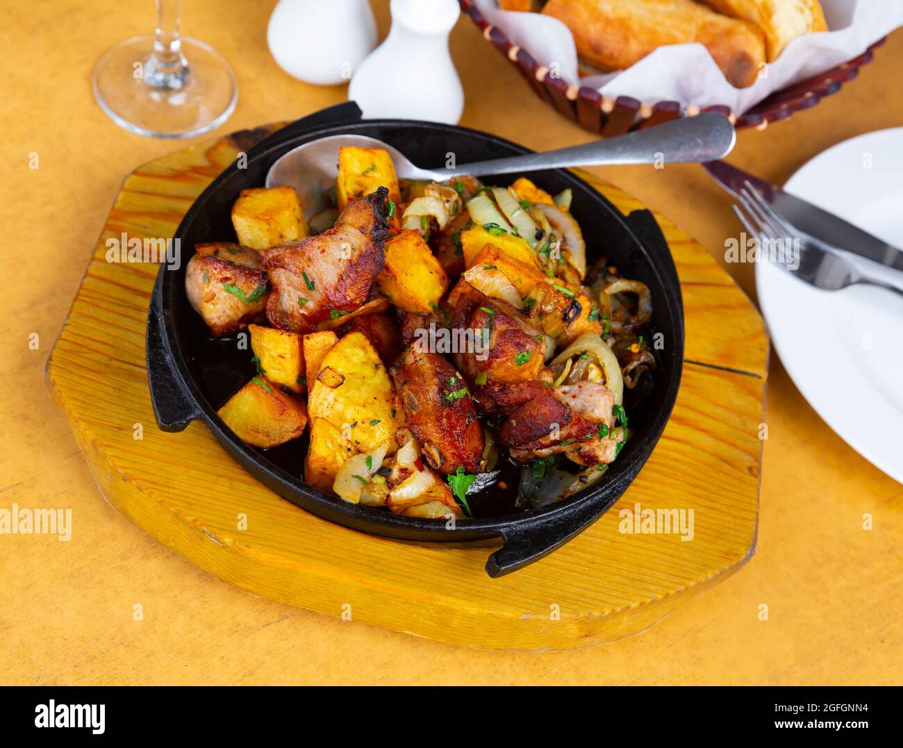 Spicy Ojakhuri from roasted pork with potatoes and onions Stock Photo ...