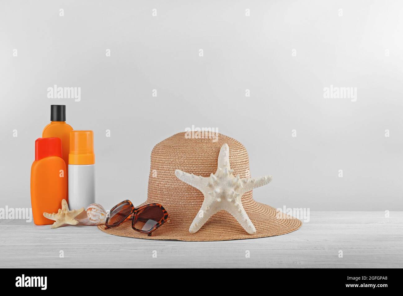 Sun protection set on white background Stock Photo - Alamy