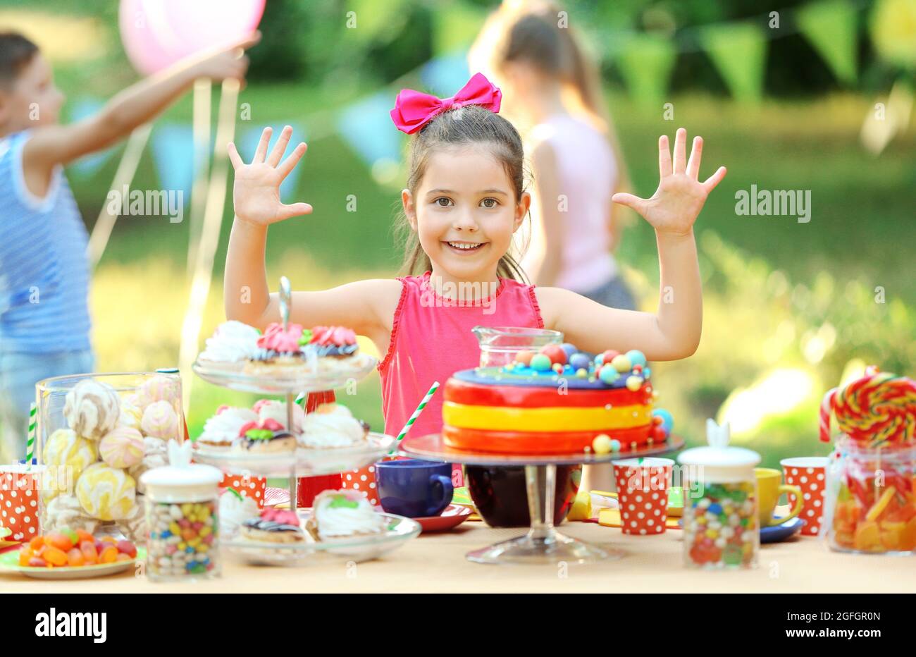 Cute girl on birthday party Stock Photo - Alamy
