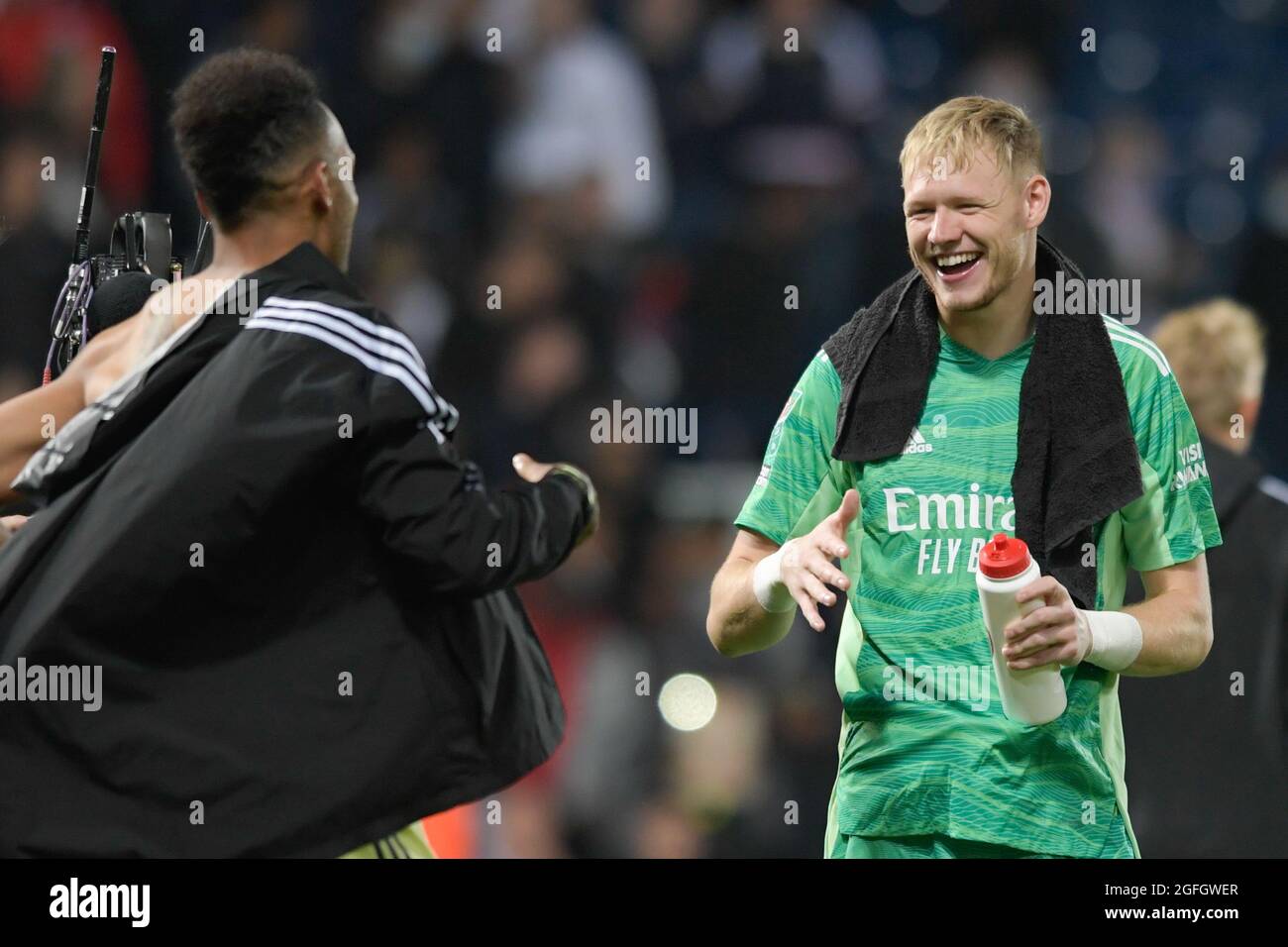 Aaron Ramsdale #32 of Arsenal celebrates with Pierre-Emerick Aubameyang ...