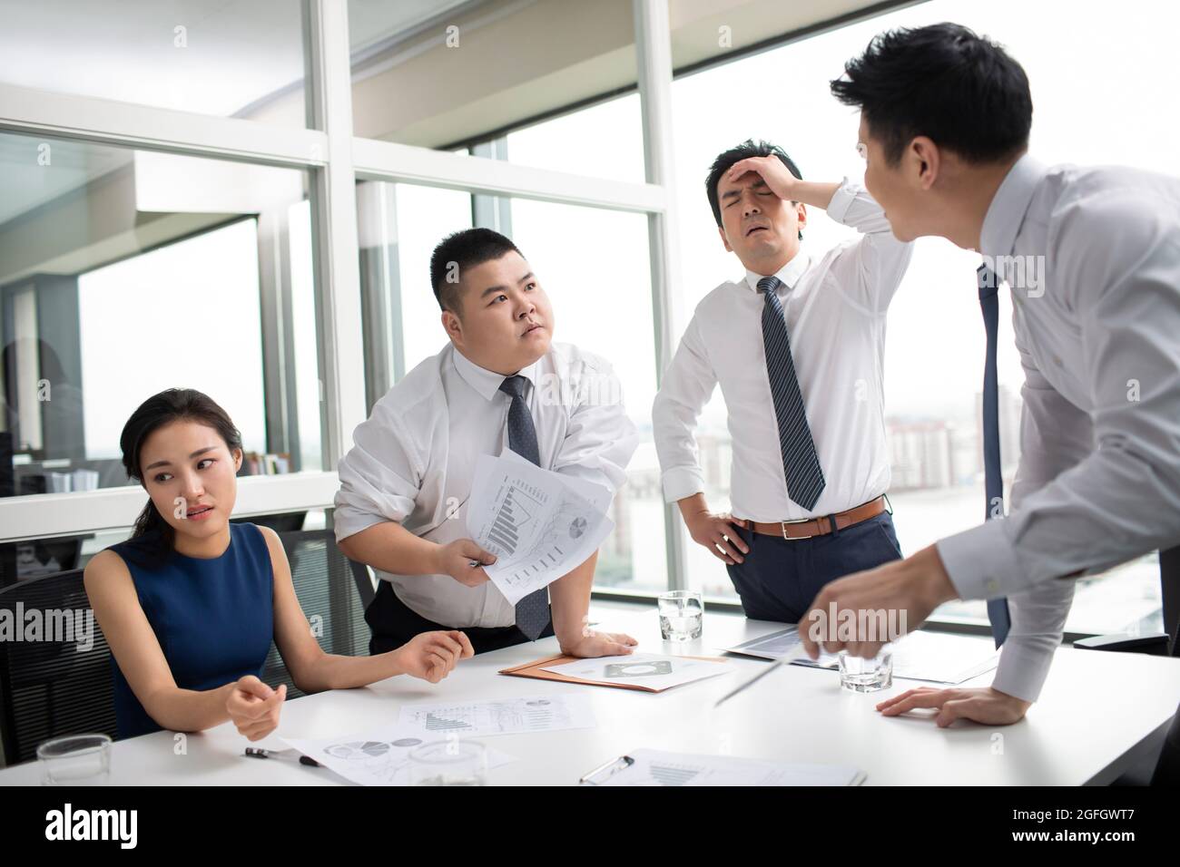 Four people arguing hi-res stock photography and images - Alamy