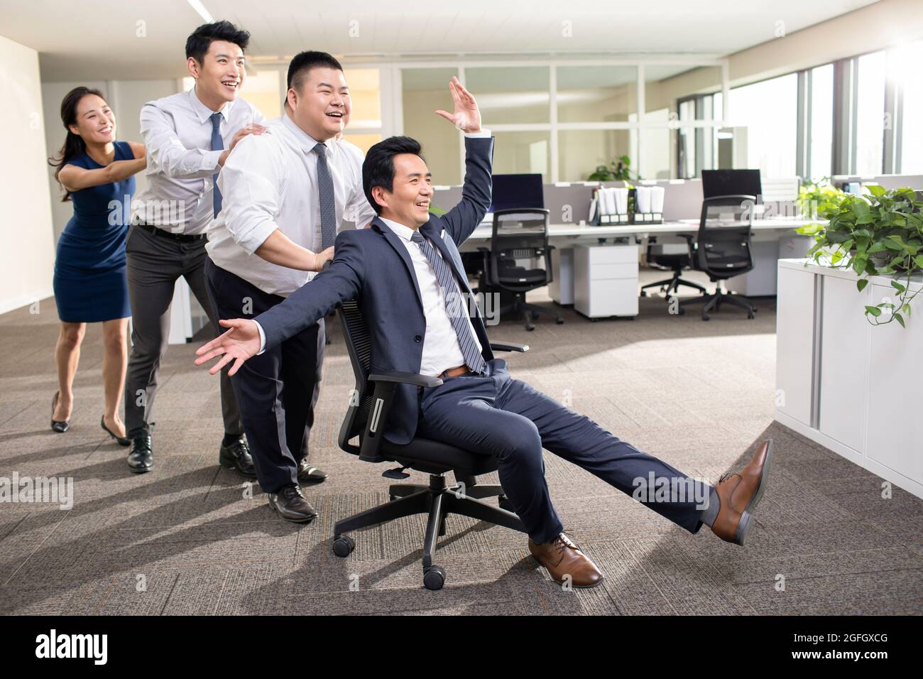 Playing games in the office hi-res stock photography and images - Alamy