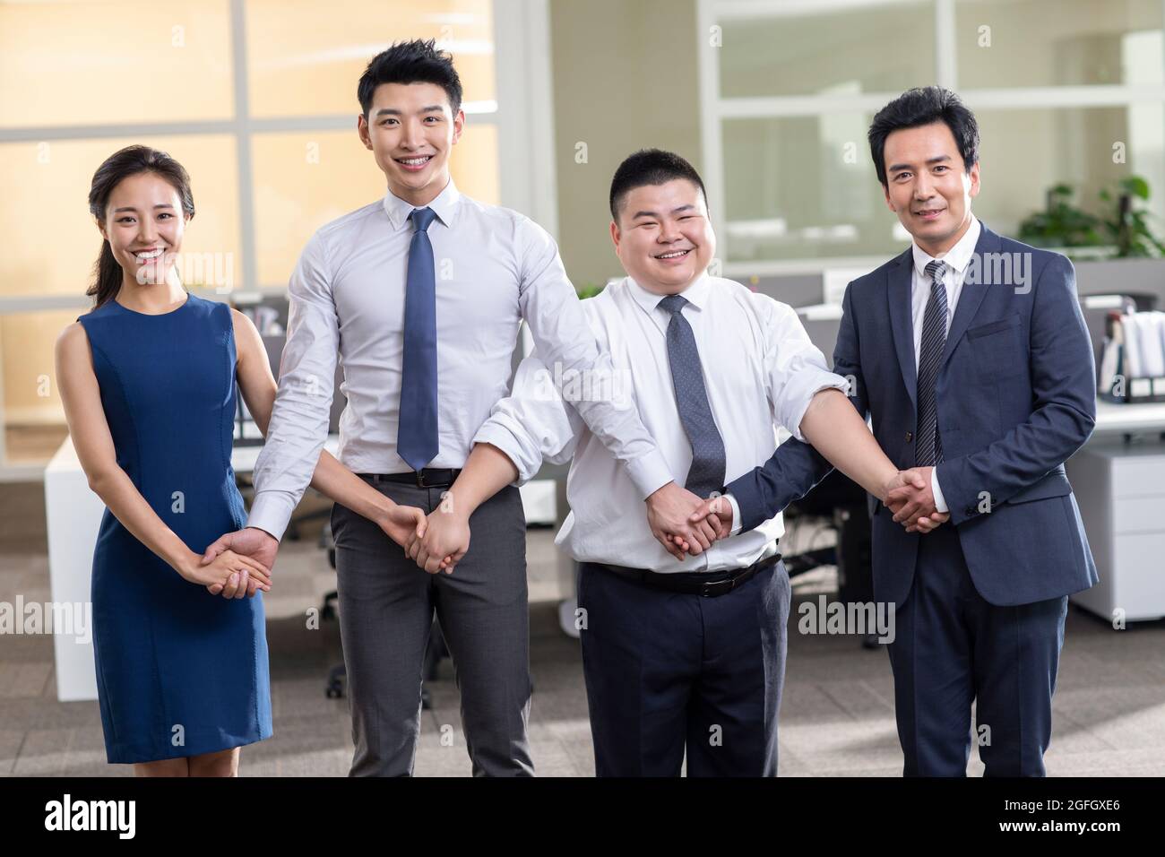 Confident business team Stock Photo - Alamy