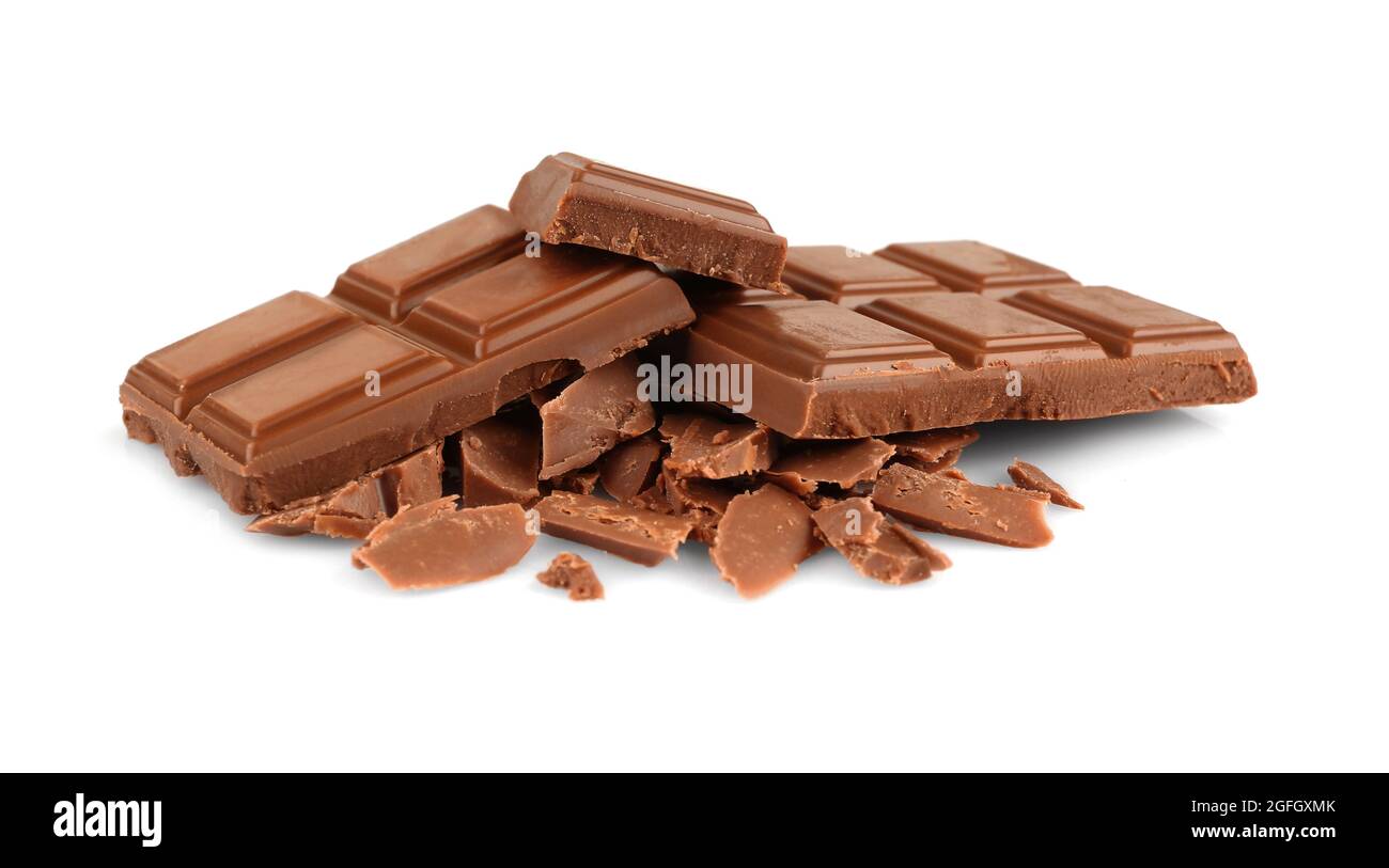 Pile of milk chocolate tiles isolated on white Stock Photo - Alamy