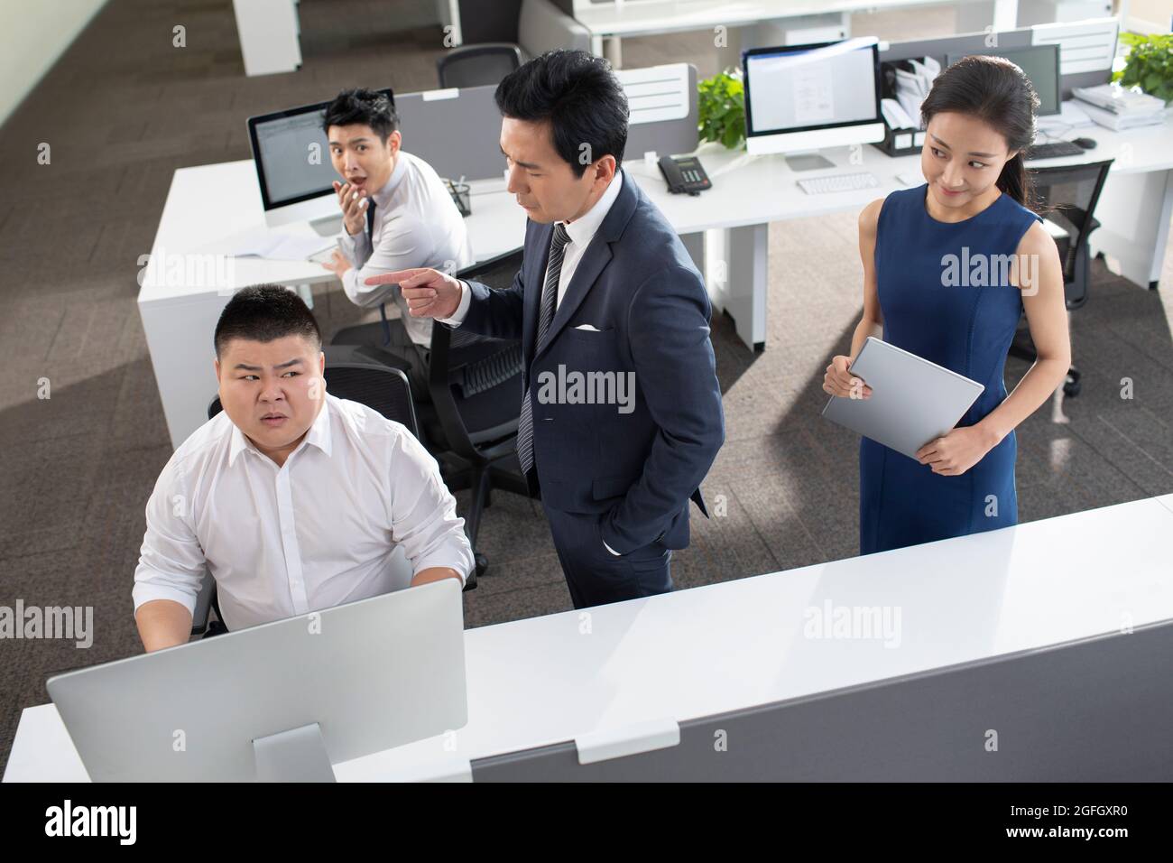 Manager scolding employee Stock Photo - Alamy
