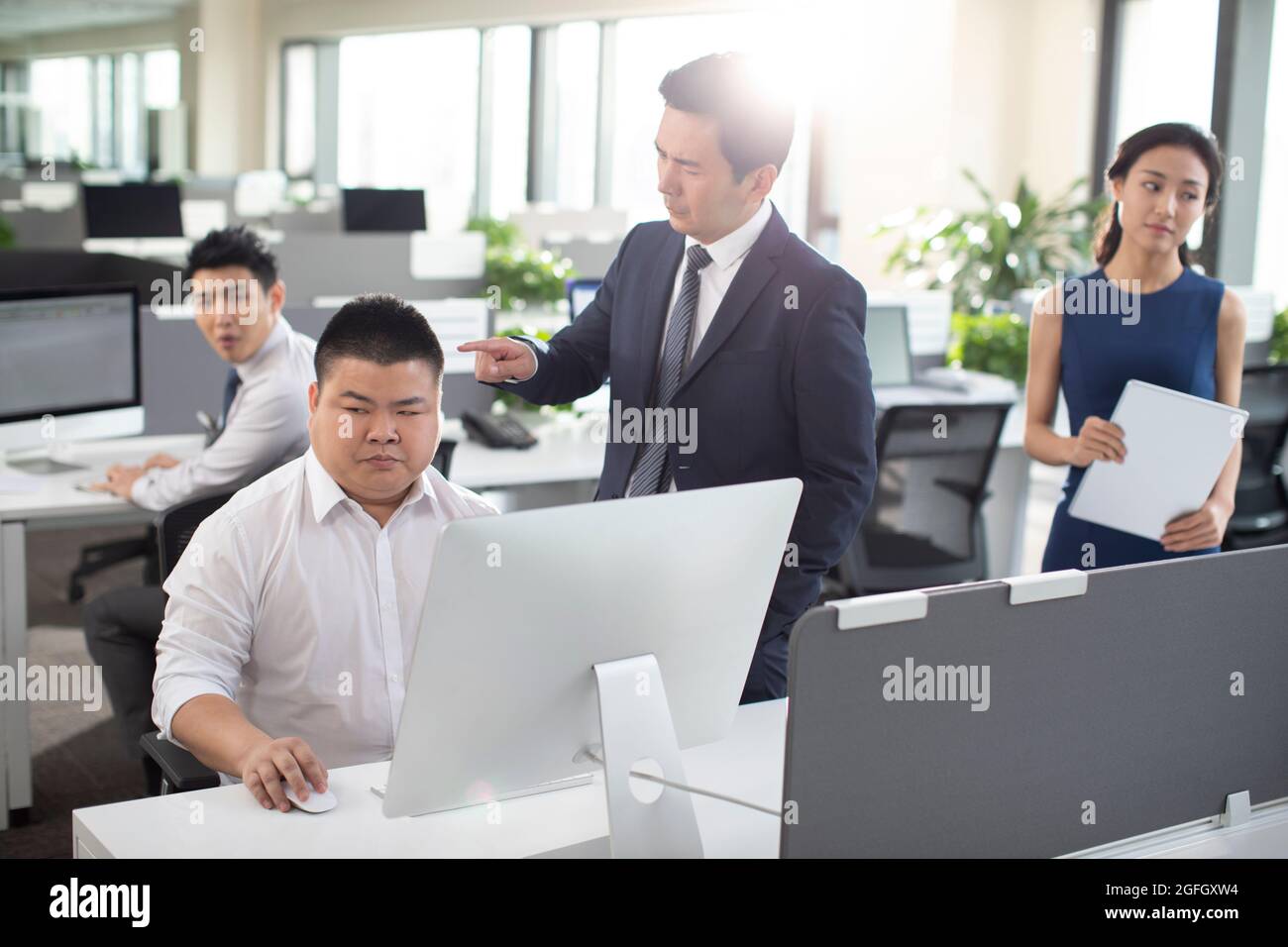 Manager scolding employee Stock Photo - Alamy