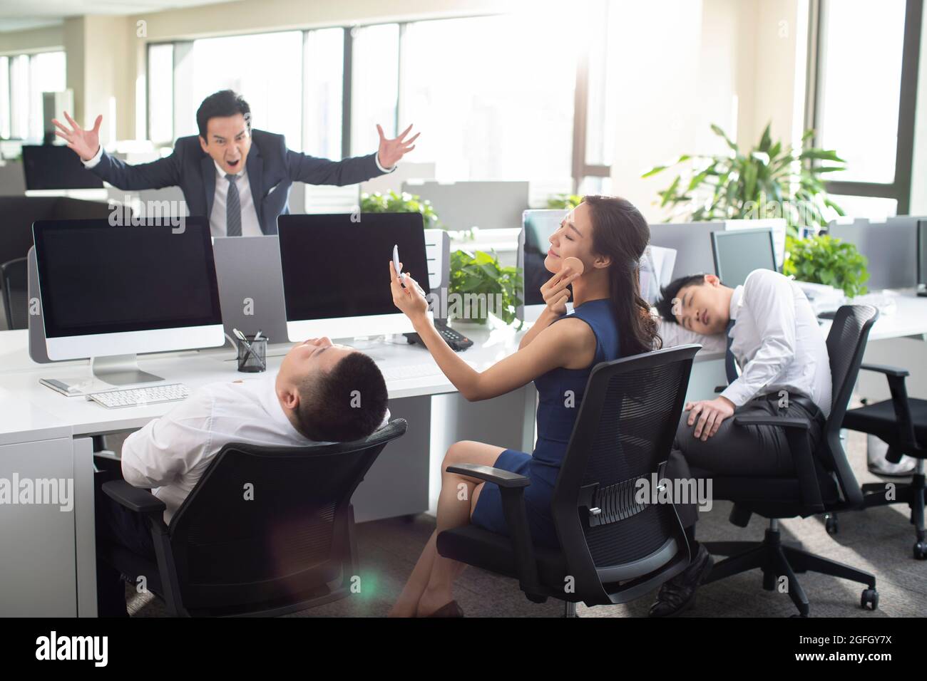 Angry manager yelling at employees in office Stock Photo - Alamy