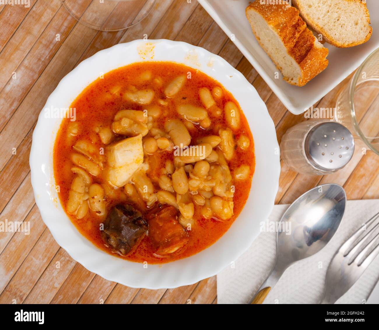 Asturian beans stew Fabada with pork, morcilla and chorizo Stock Photo ...