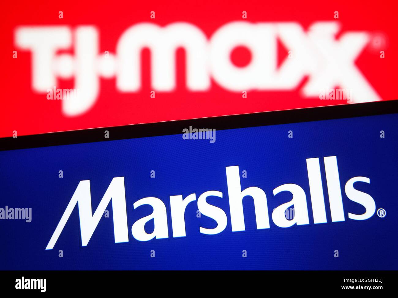 In this photo illustration a Marshalls logo is seen on a smartphone screen with a TJ Maxx logo ...