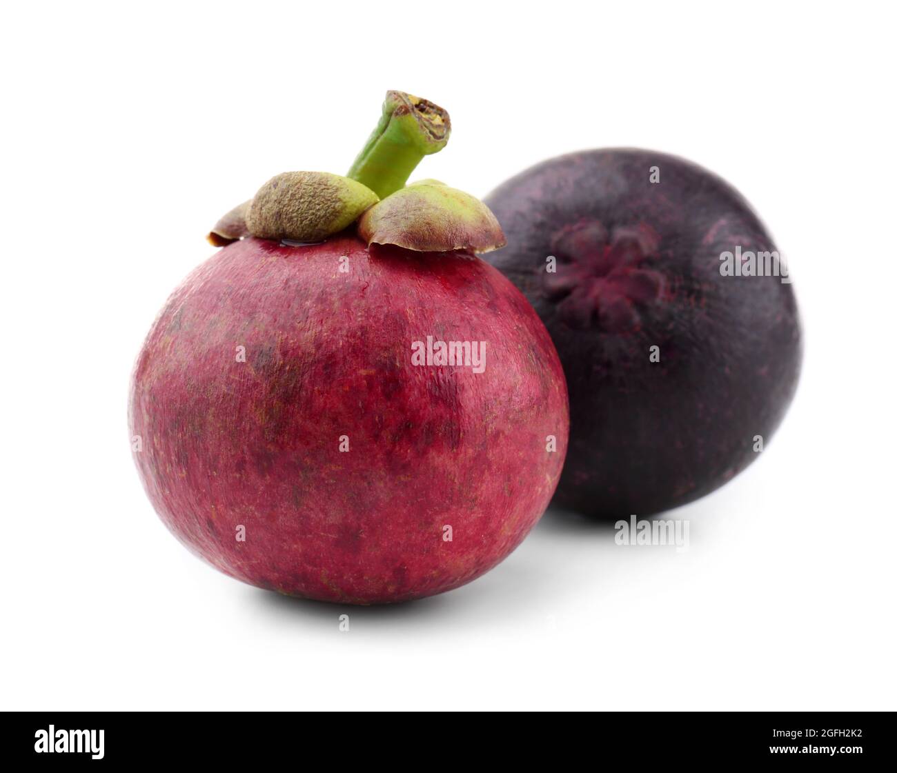 Ripe mangosteen fruits isolated on white Stock Photo - Alamy