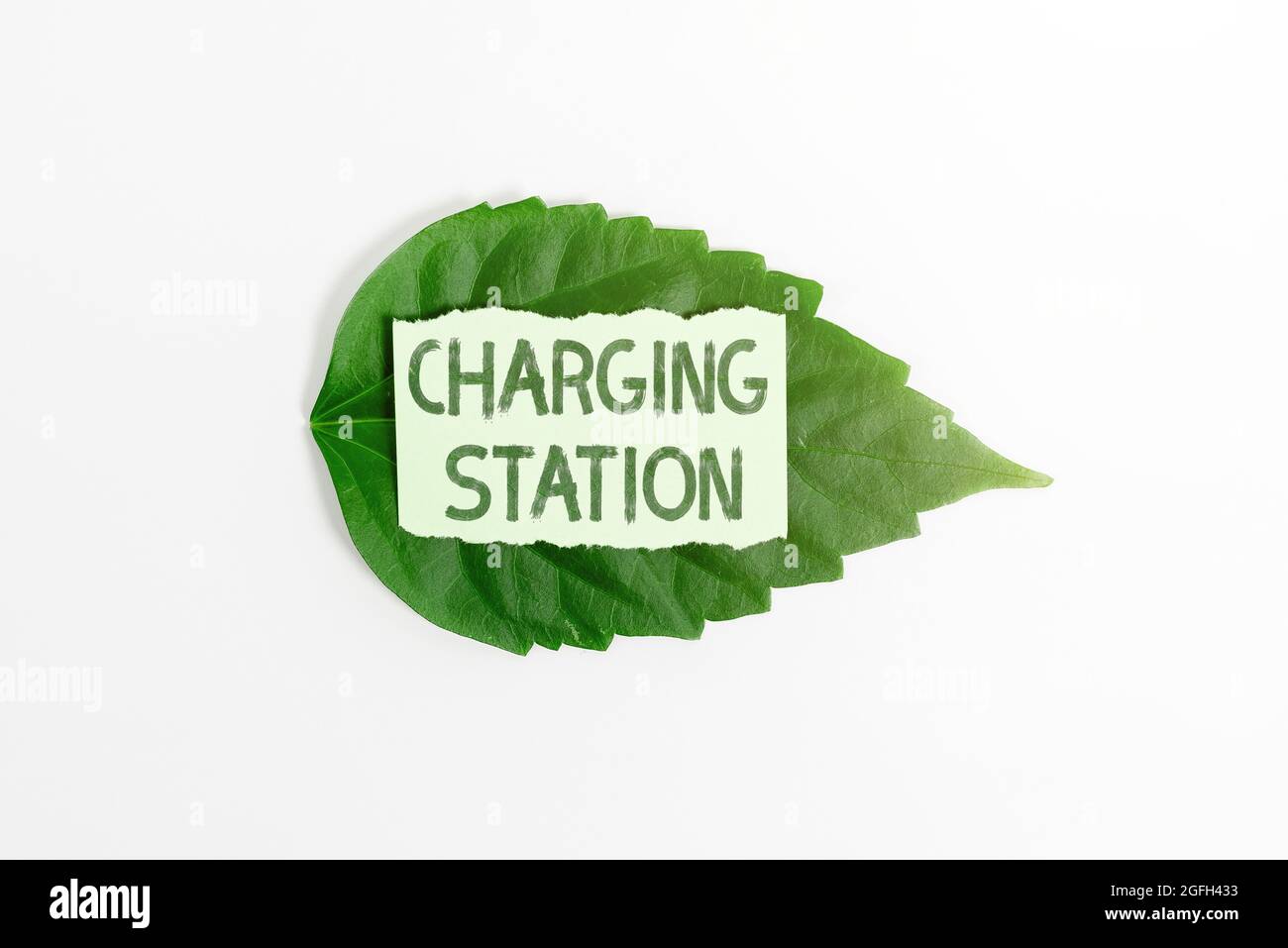 Handwriting text Charging Station. Word Written on places where showing ...