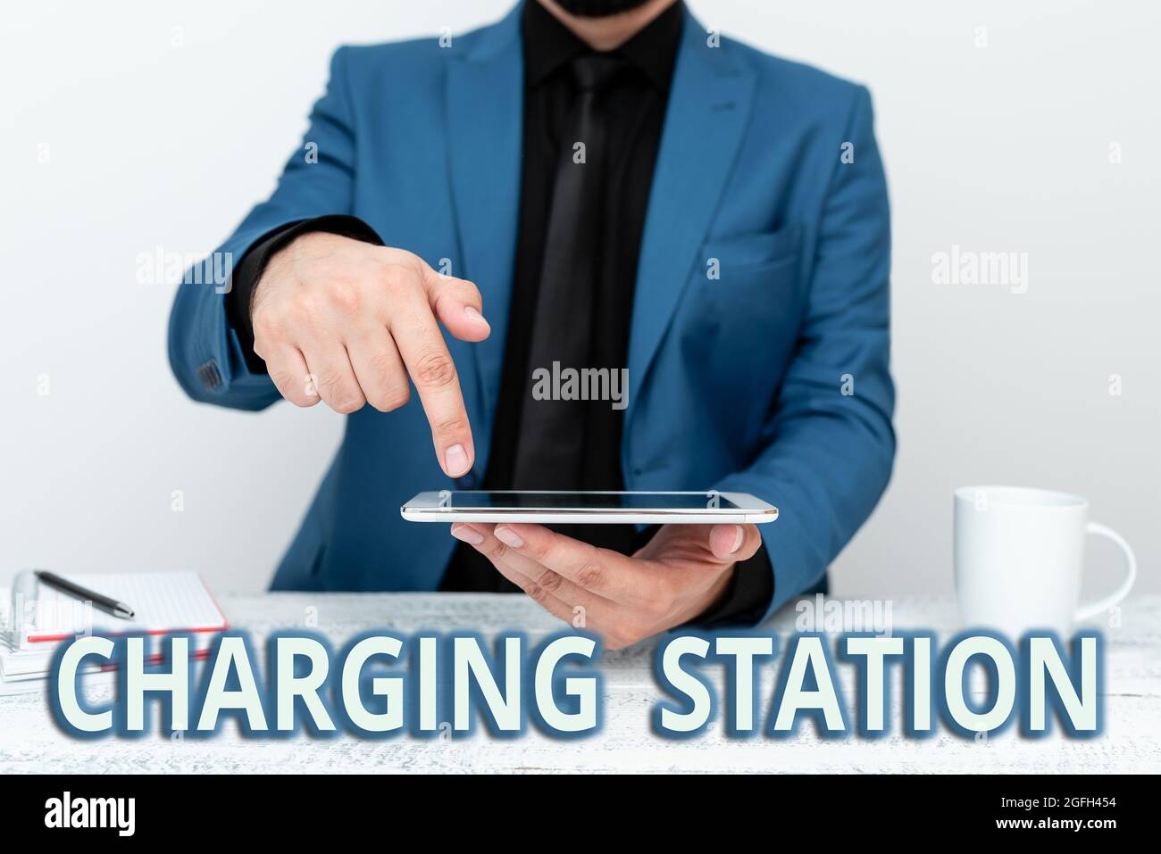 Text sign showing Charging Station. Word Written on places where ...