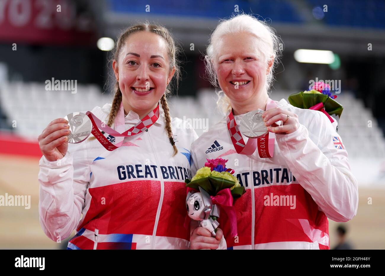 Great Britain's Aileen McGlynn and pilot Helen Scott pose with their ...