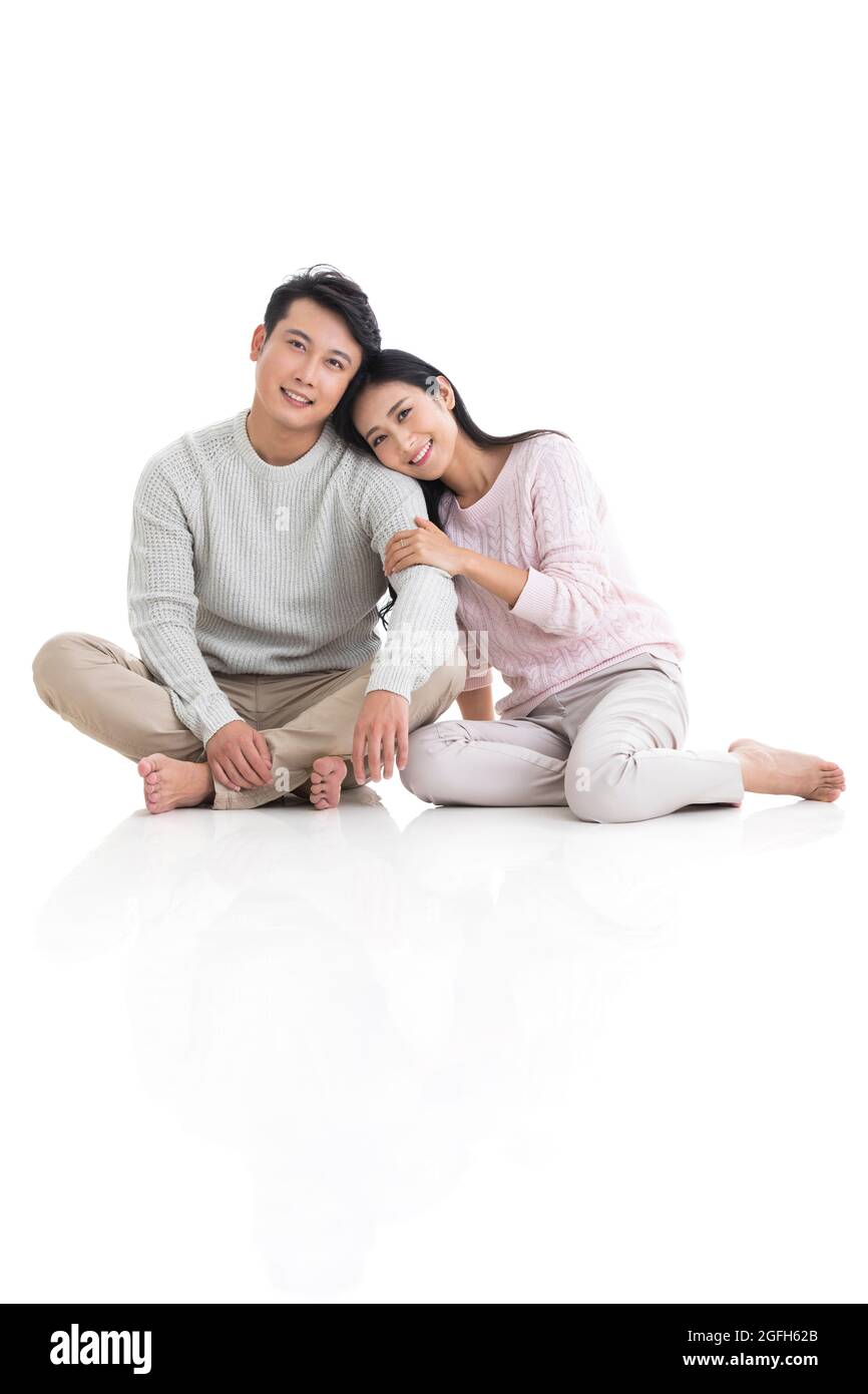 Adult couple in love sitting Cut Out Stock Images & Pictures - Alamy