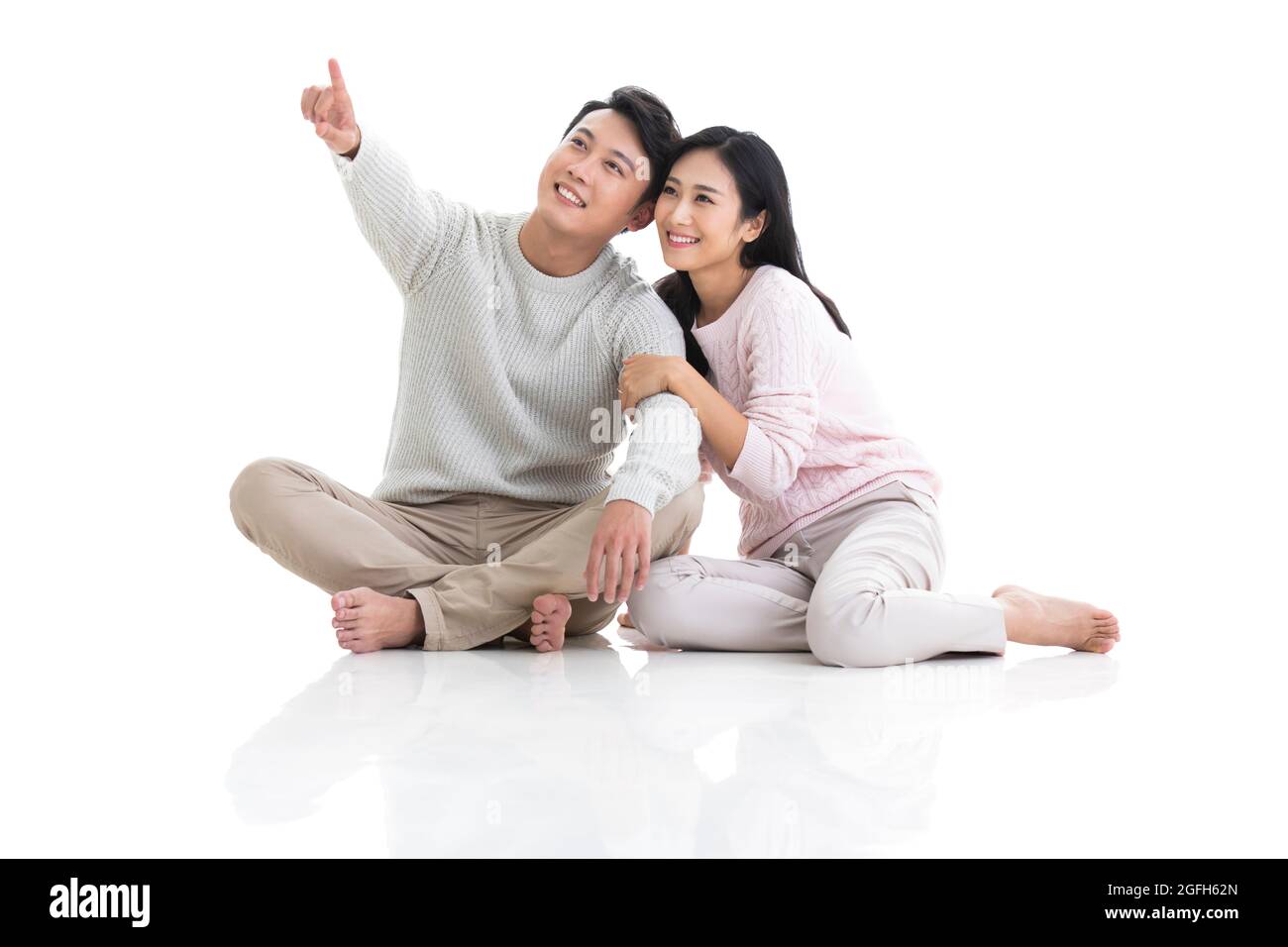 Adult couple in love sitting Cut Out Stock Images & Pictures - Alamy