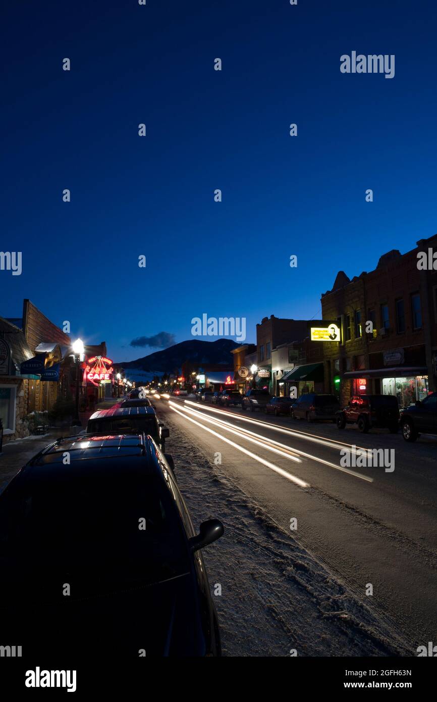 Neon signs gleam, head and tail lights streak and the horizon fades ...