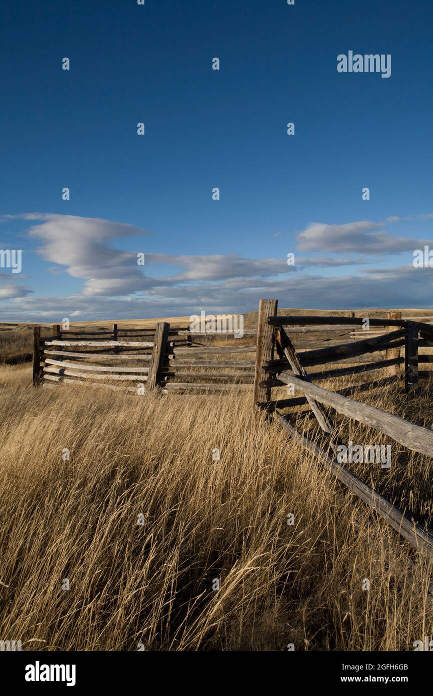Fallen fence rails fall and leaning posts show the ravages of time on ...