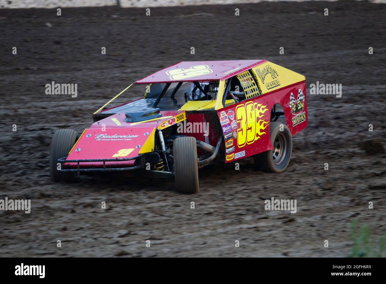 Midwest Modified stock car drifts around a turn on the Electric City ...