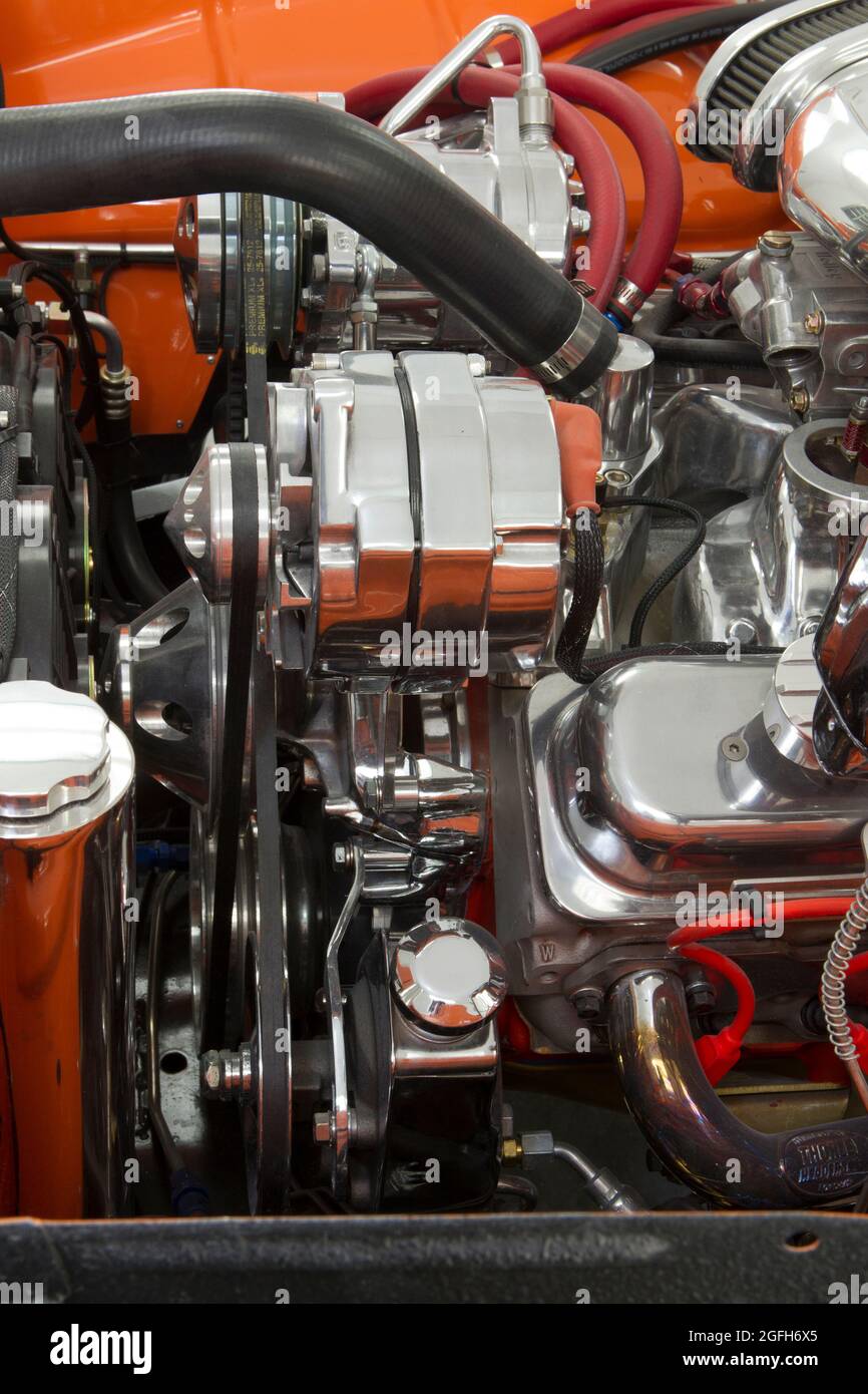 Chrome accessories and components brighten the engine compartment of ...