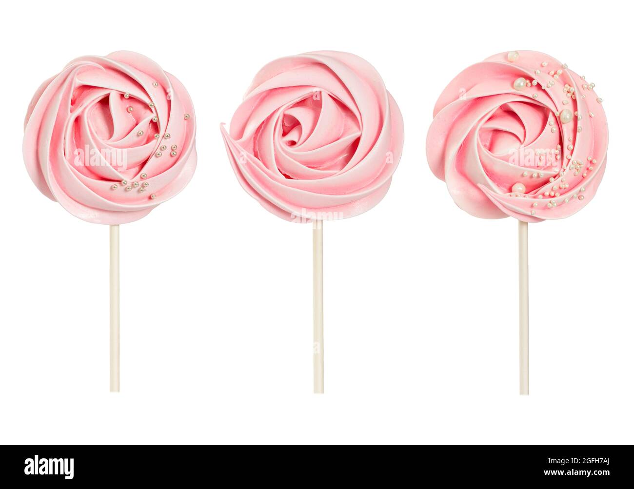 Set of meringue rose shaped with decorative sprinkle isolated on white ...
