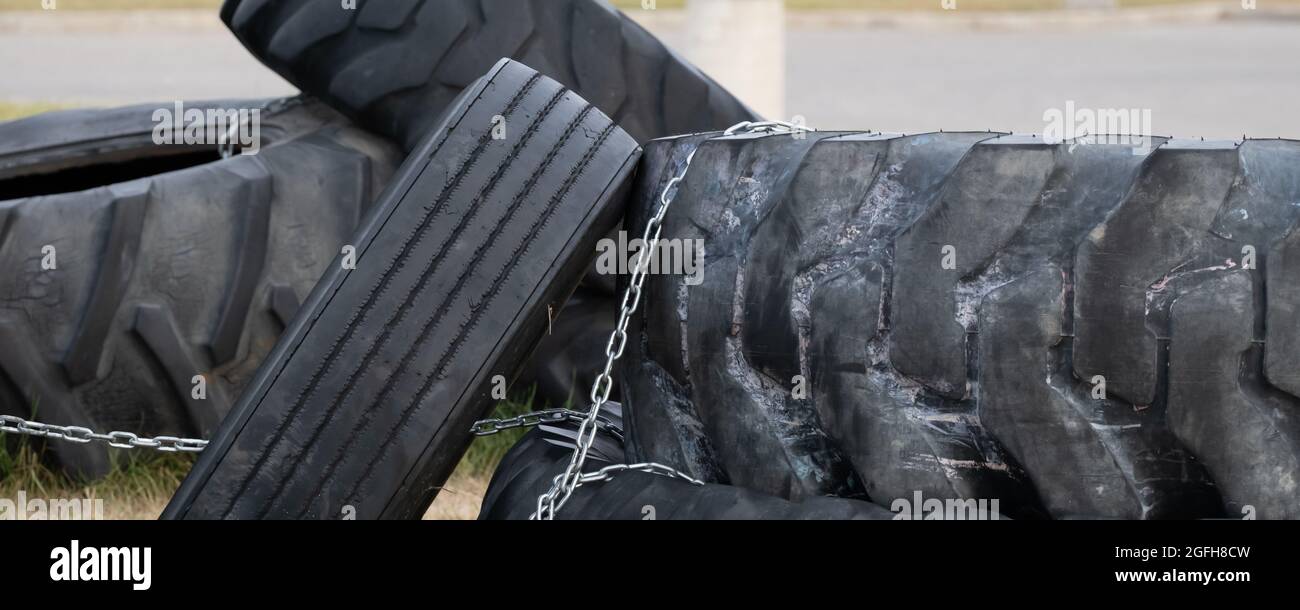old tires used as a park art display in city Stock Photo - Alamy