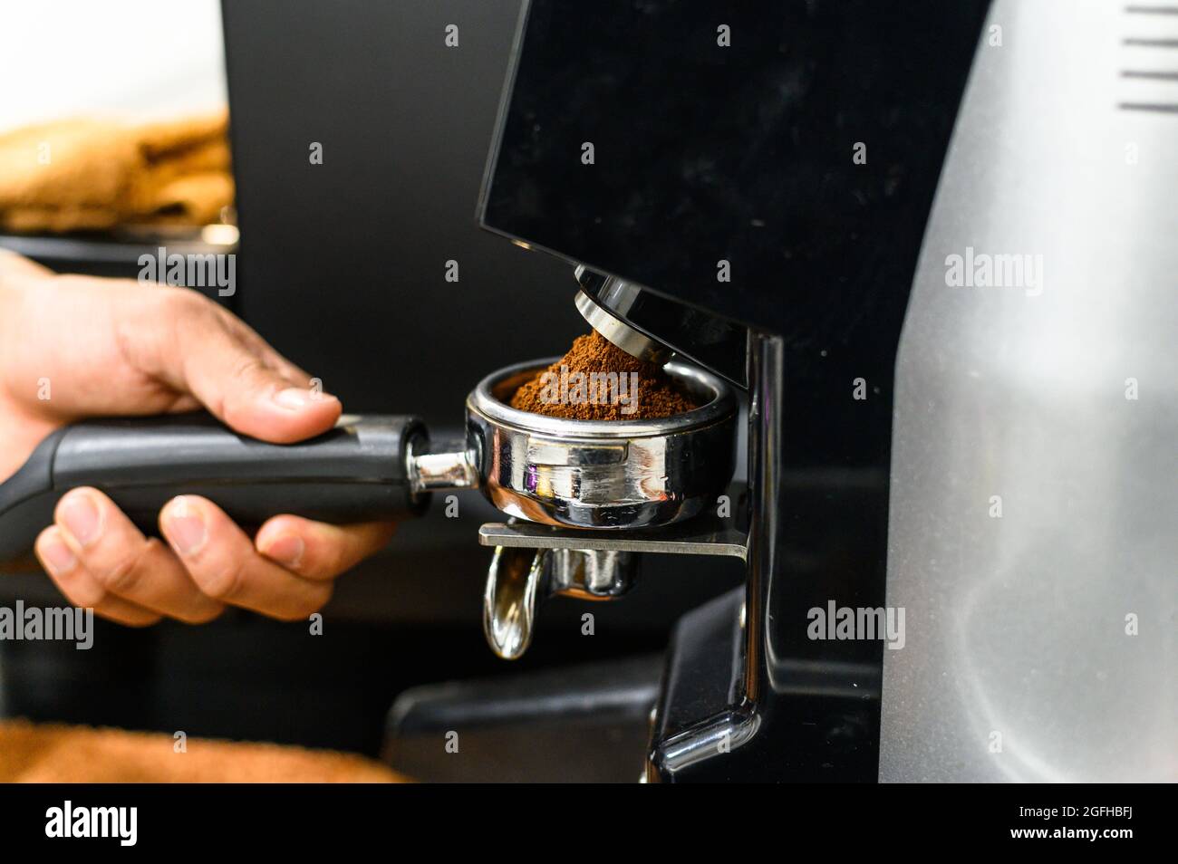 Freshly roasted coffee grinder to turn the beans into powder Stock ...