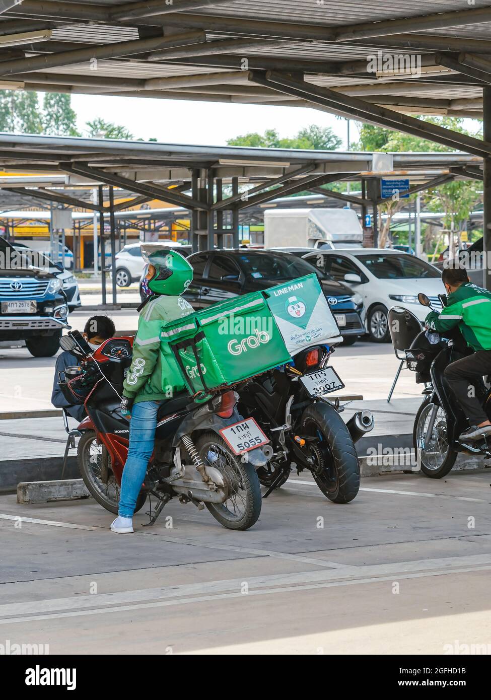 KANCHANABURI, THAILAND-AUGUST 22,2021 : Group of Grab riders park ...