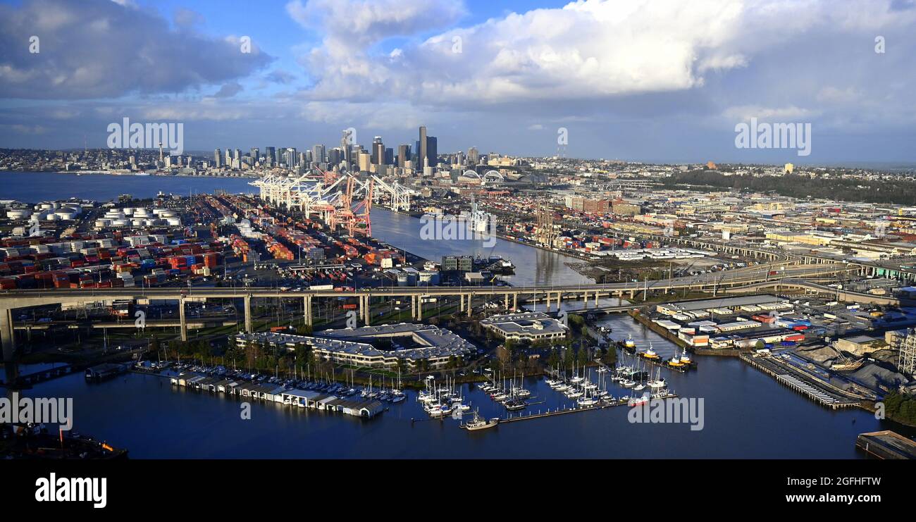 AERIAL VIEW OF THE WEST SEATTLE BRIDGE, HARBOR ISLAND SHIPYARDS, AND ...