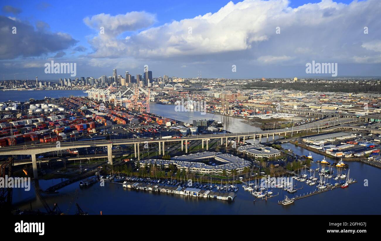 AERIAL VIEW OF THE WEST SEATTLE BRIDGE, HARBOR ISLAND SHIPYARDS, AND ...