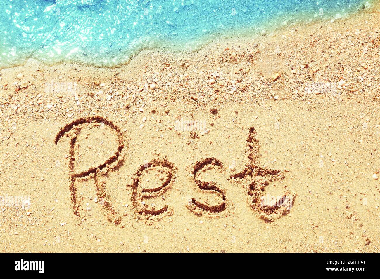 Word REST on beach sand Stock Photo - Alamy