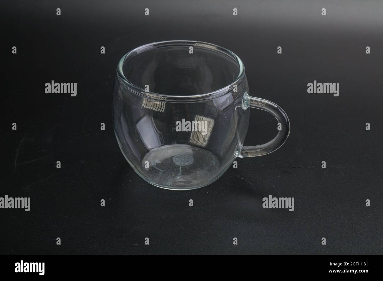 Empty glass cup for drinks isolated Stock Photo - Alamy