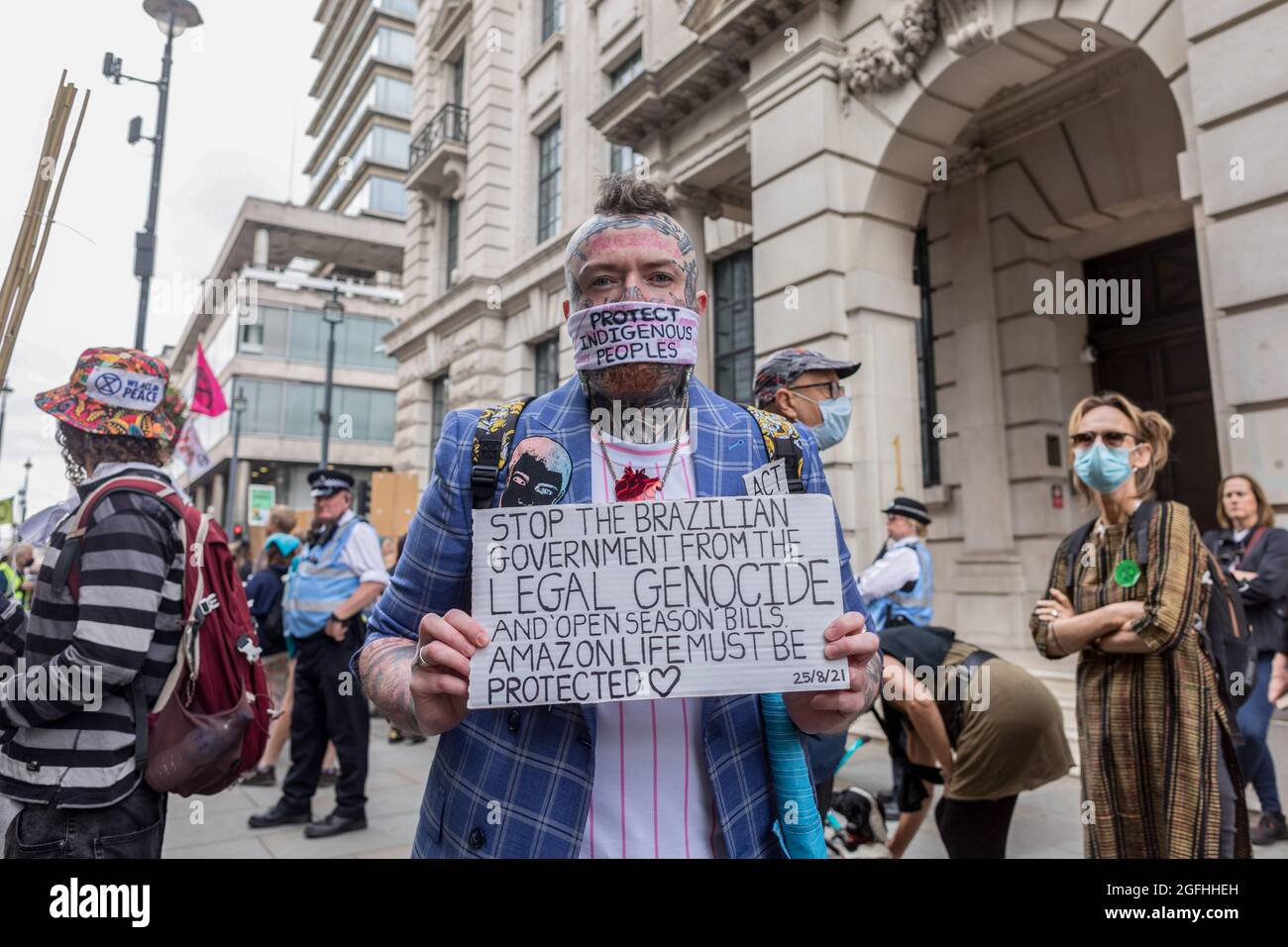 A protester holds a placard expressing her opinion during the ...