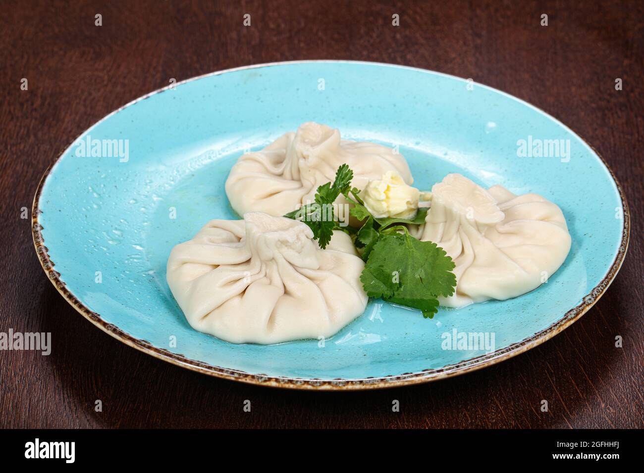 Georgian traditional cuisine - khinkali dumplings with meat Stock Photo ...