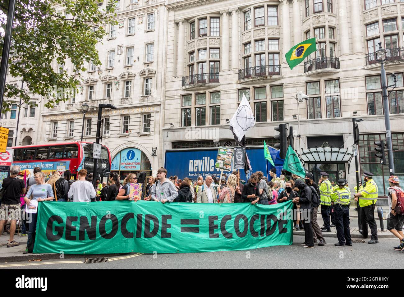 Protesters hold a banner expressing their opinions during the ...