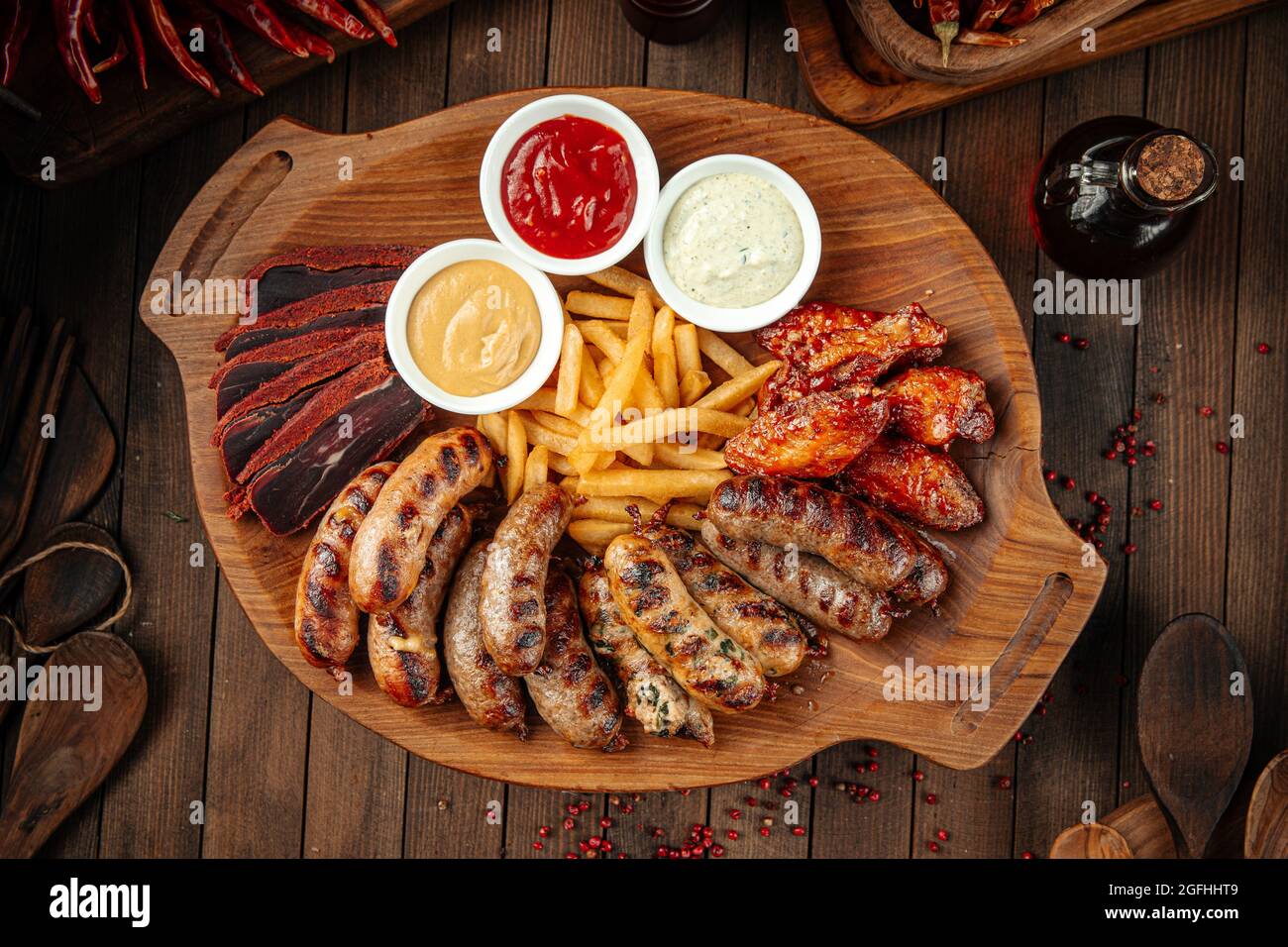 Wooden tray of beer appetizers set assortment Stock Photo - Alamy