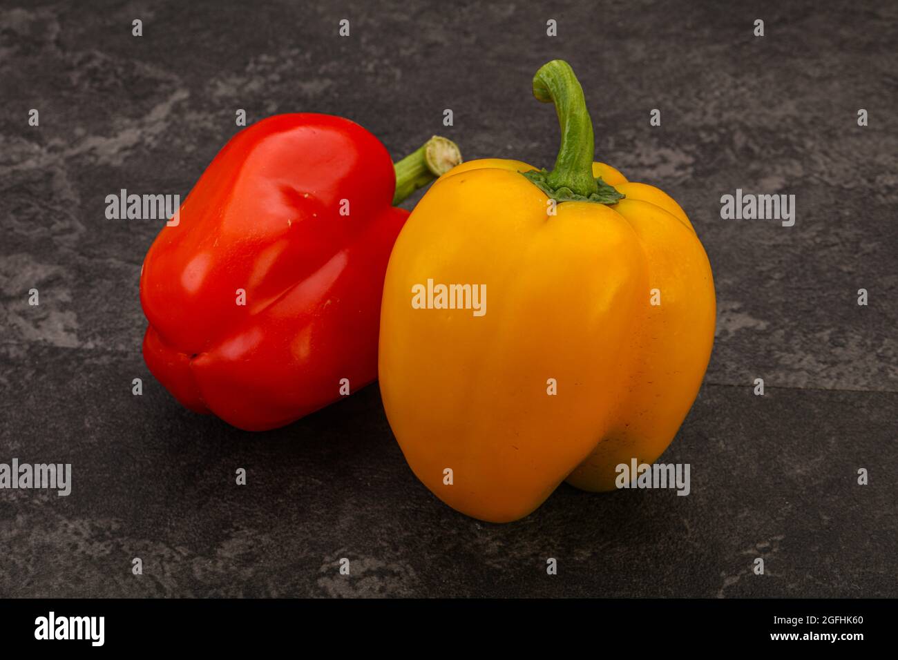 Two Ripe sweet Bulgarian bell peppers Stock Photo - Alamy