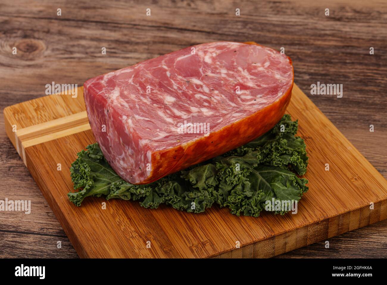 Tasty Beef ham piece over board Stock Photo - Alamy