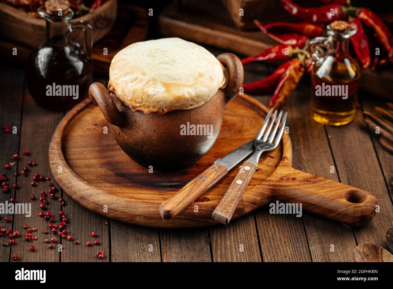 Georgian dish stewed meat chakondrili in a pot Stock Photo - Alamy
