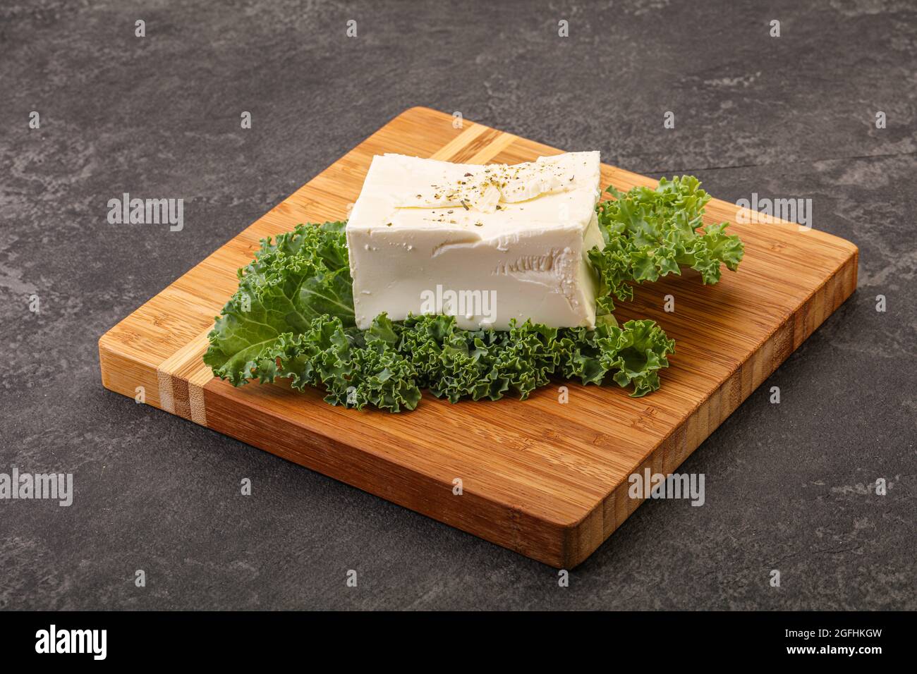 Traditional tasty Greek Feta soft cheese brick Stock Photo - Alamy
