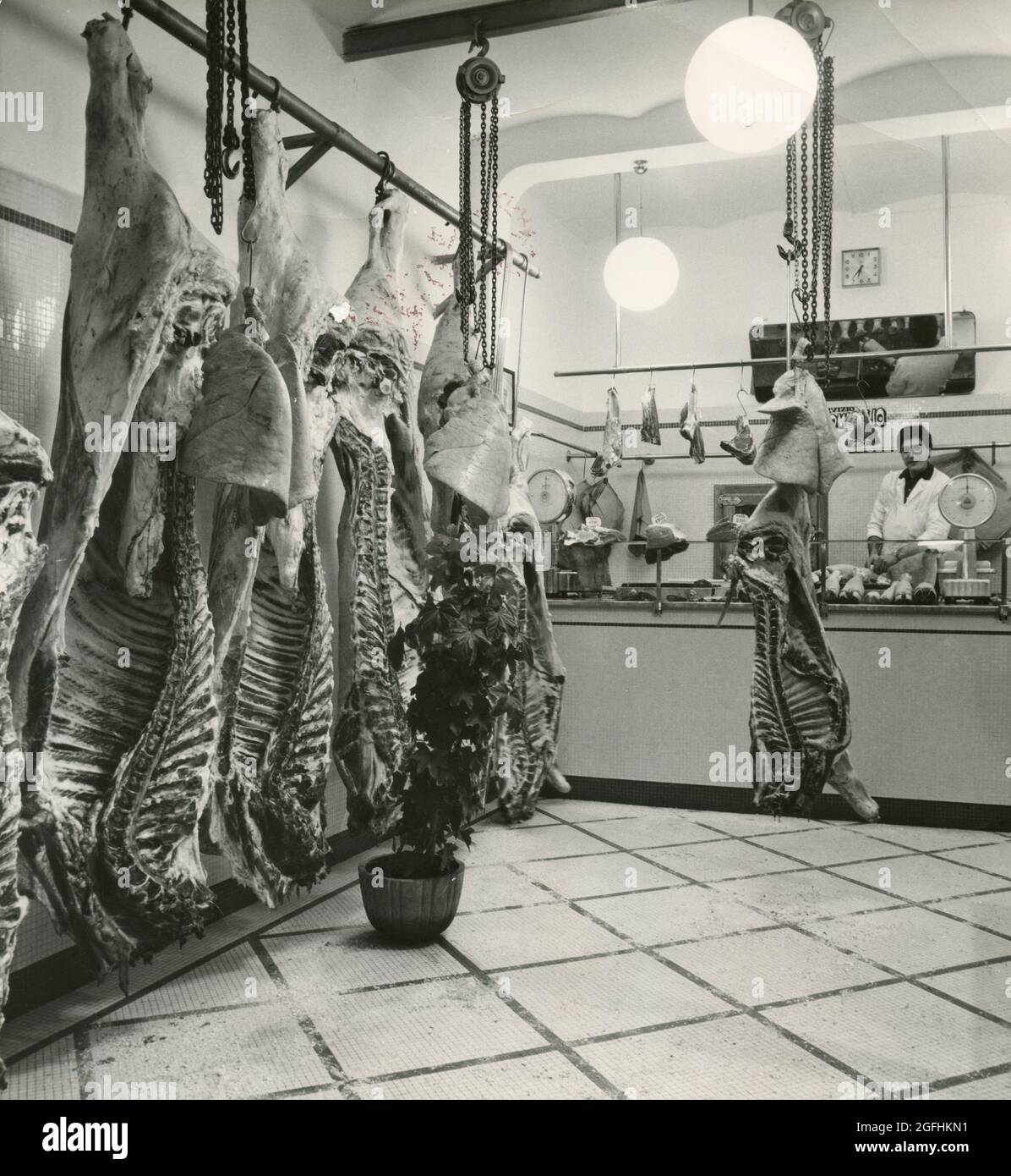 Butcher's shop, Italy 1970s Stock Photo - Alamy