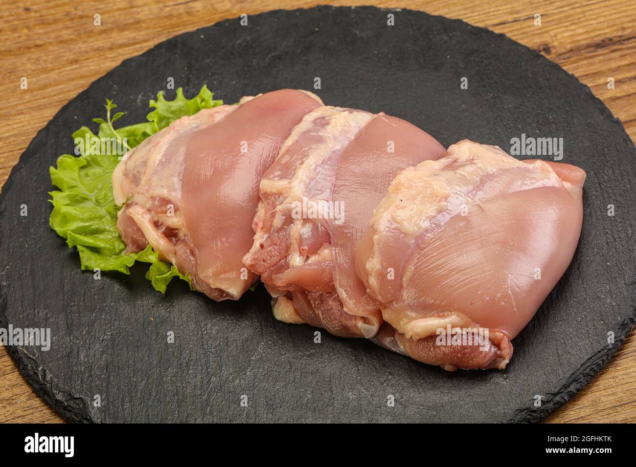 Raw chicken boneless and skinless leg for cooking Stock Photo - Alamy