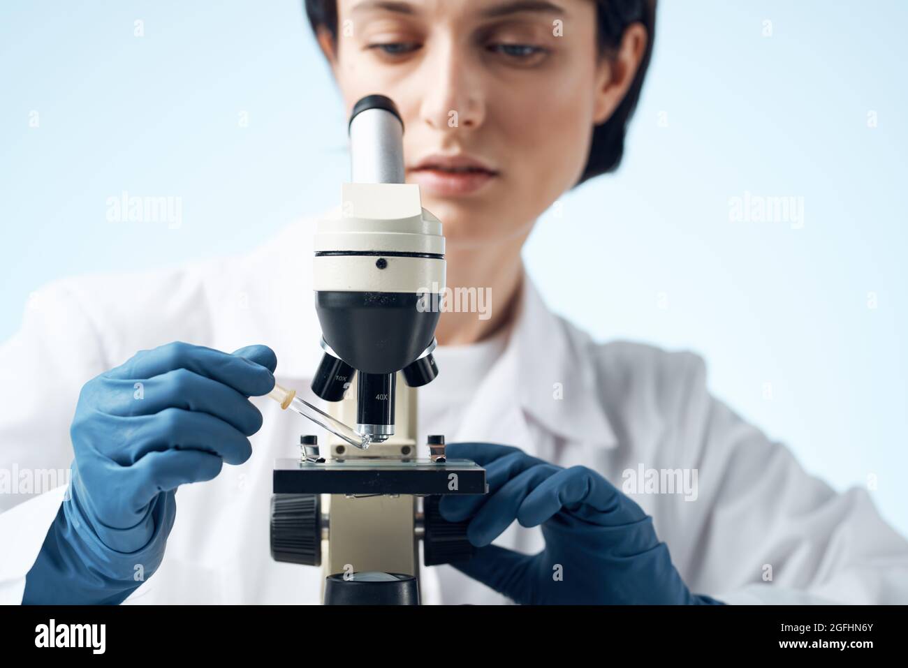 female laboratory assistant professional research science microscope ...