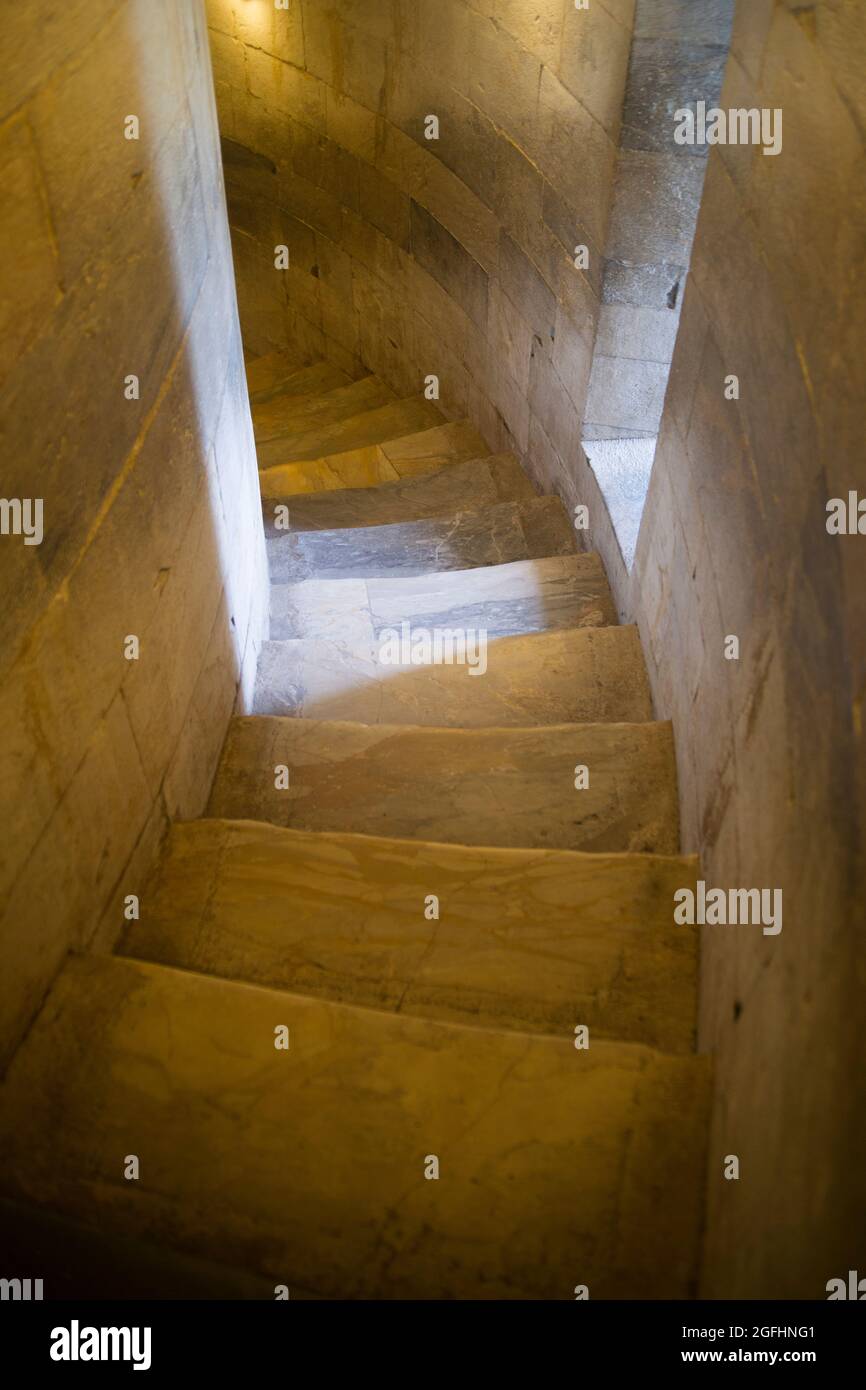 Old, worn marble stairs from the wear of time and the passage of the ...