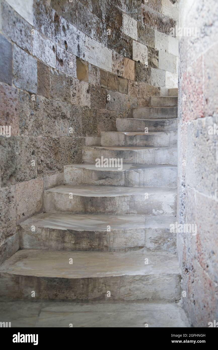 Old, worn marble stairs from the wear of time and the passage of the ...