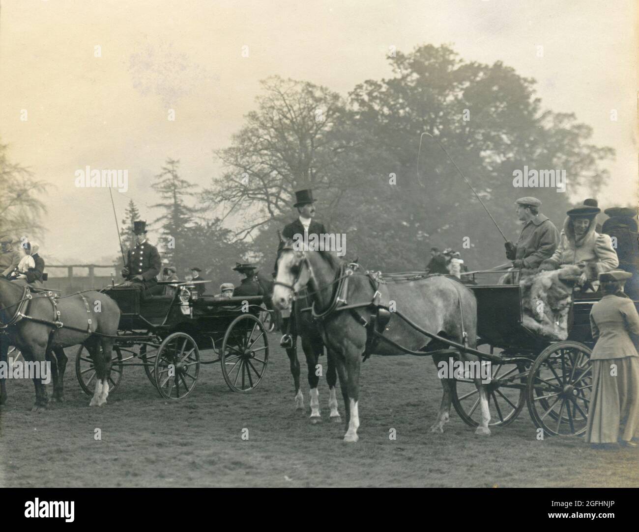 Families meeting in the countryside with the horse carts, UK 1908 Stock ...