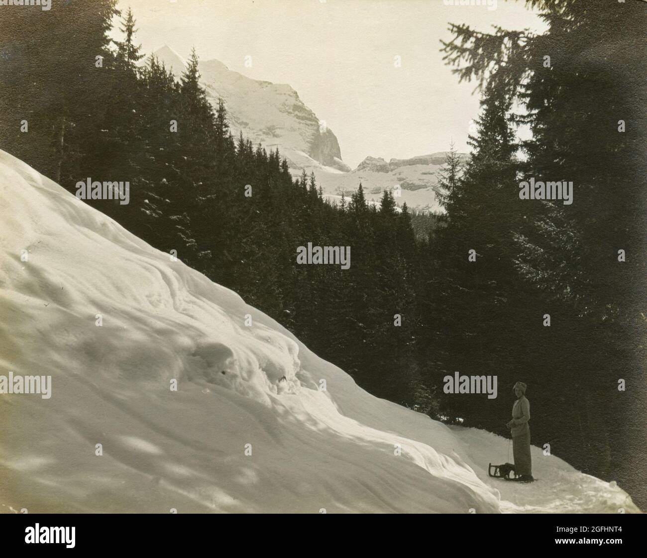 Woman with a sledge on the snow track, Steinenwaldweg, Switzerland 1908 ...