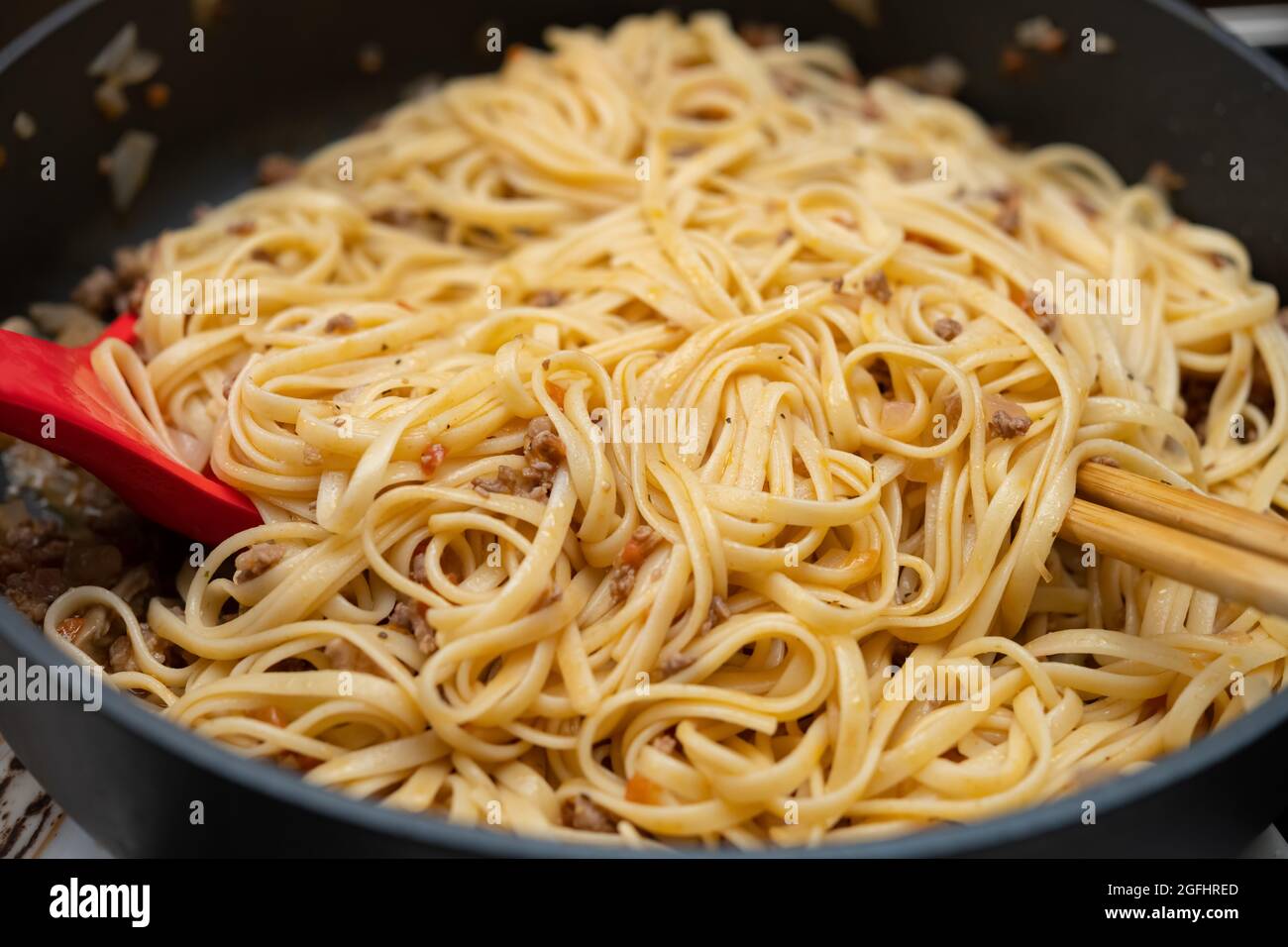 angle view home cooked fresh Italian spaghetti with smashed Stock Photo ...