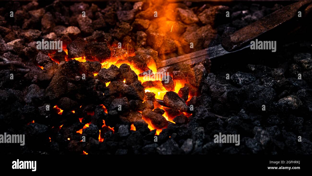 Fire crackling in blacksmith workshop of forging metal Stock Photo - Alamy