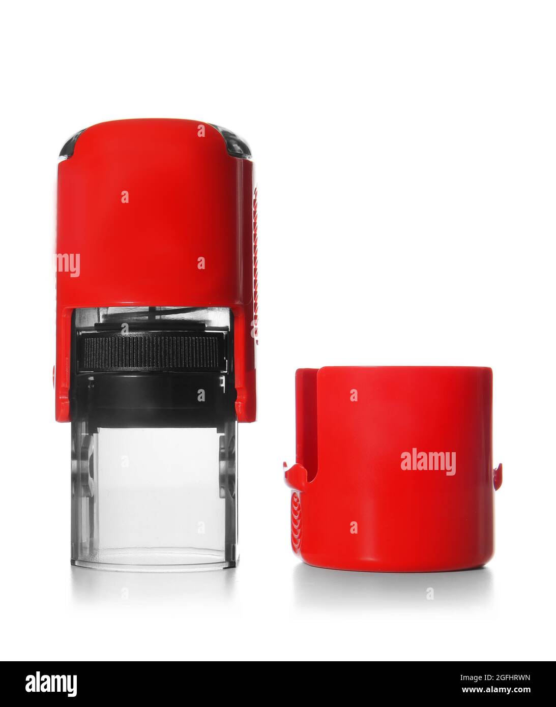 Self-inking red stamp on white background Stock Photo - Alamy
