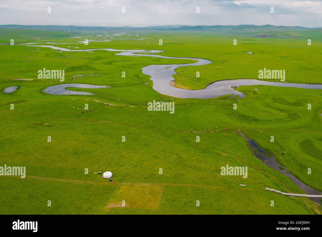 Aerial view of a river winding up in Hulun Buir grassland, in Inner ...
